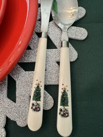 A German Christmas Tablescape set with beautiful red stoneware.