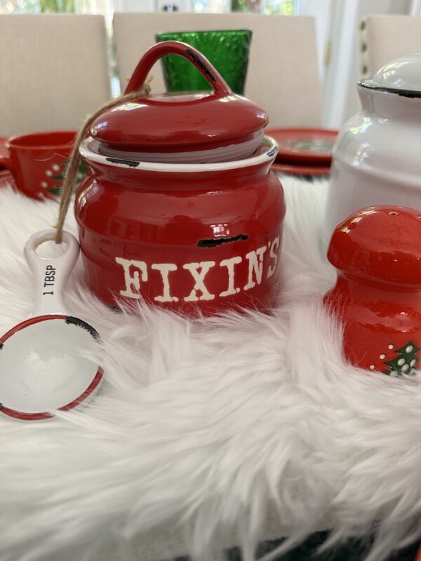 A German Christmas Tablescape set with beautiful red stoneware.